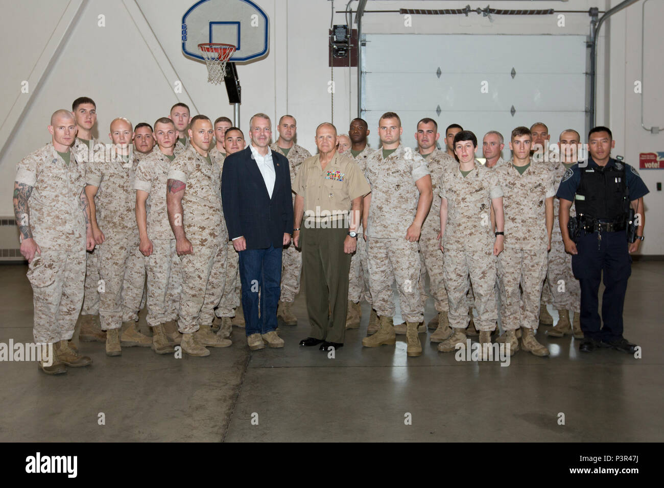 Commandant of the Marine Corps Gen. Robert B. Neller, left, poses for a ...