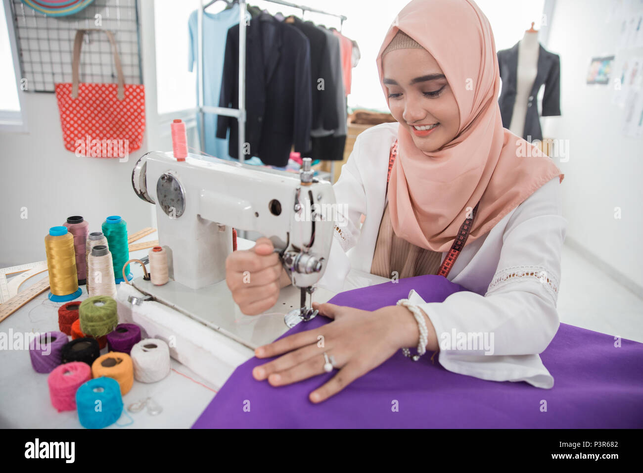 fashion designer make a suit Stock Photo - Alamy