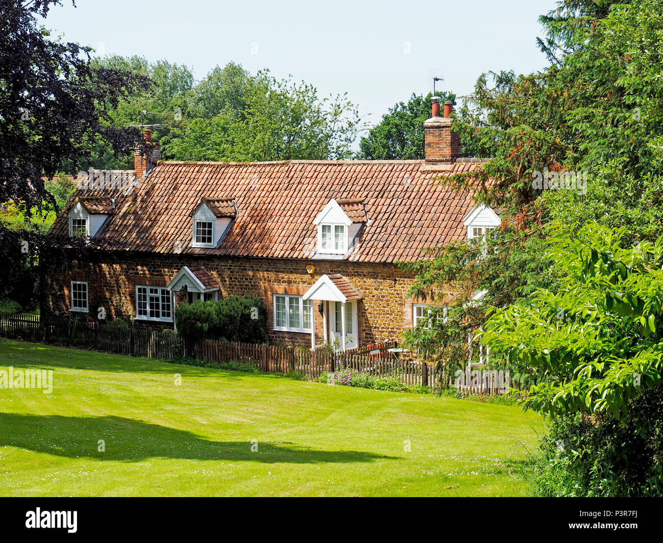Carstone cottages by the village green the pretty West Norfolk village ...