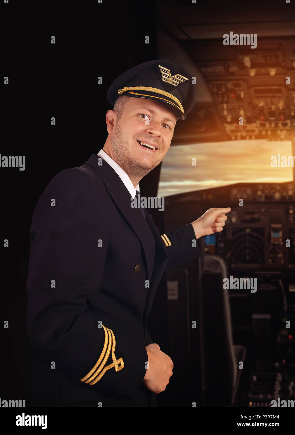 joyful pilot captain invites to the cockpit Stock Photo - Alamy
