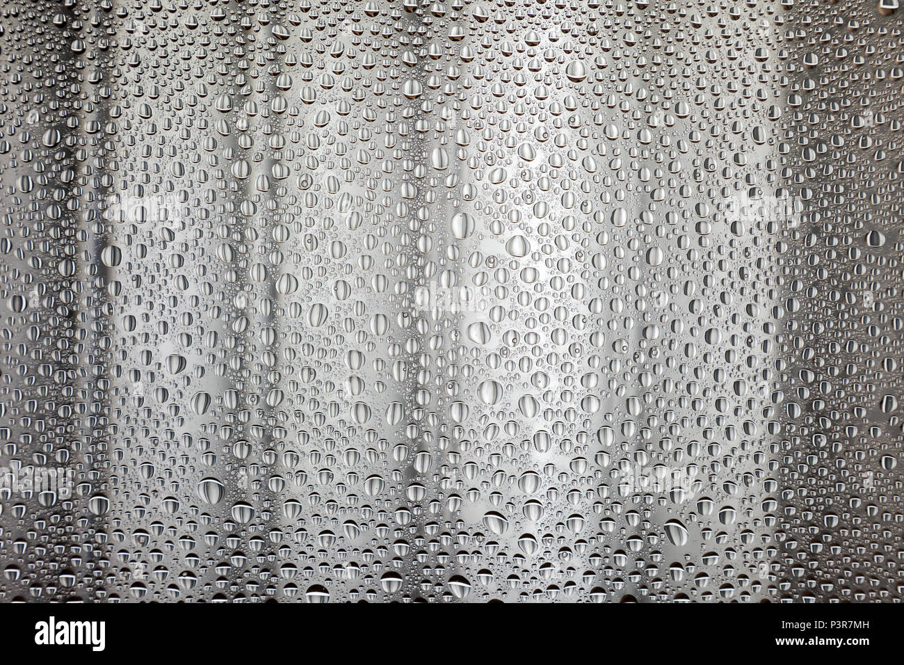 Close up of a water drops on a on a white stripe background, covered ...