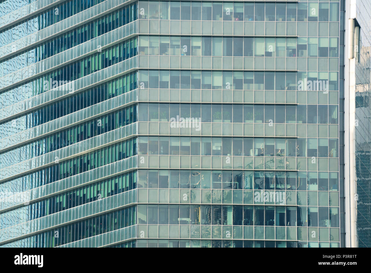 Glass facade of modern city high rise buildings background Stock Photo ...
