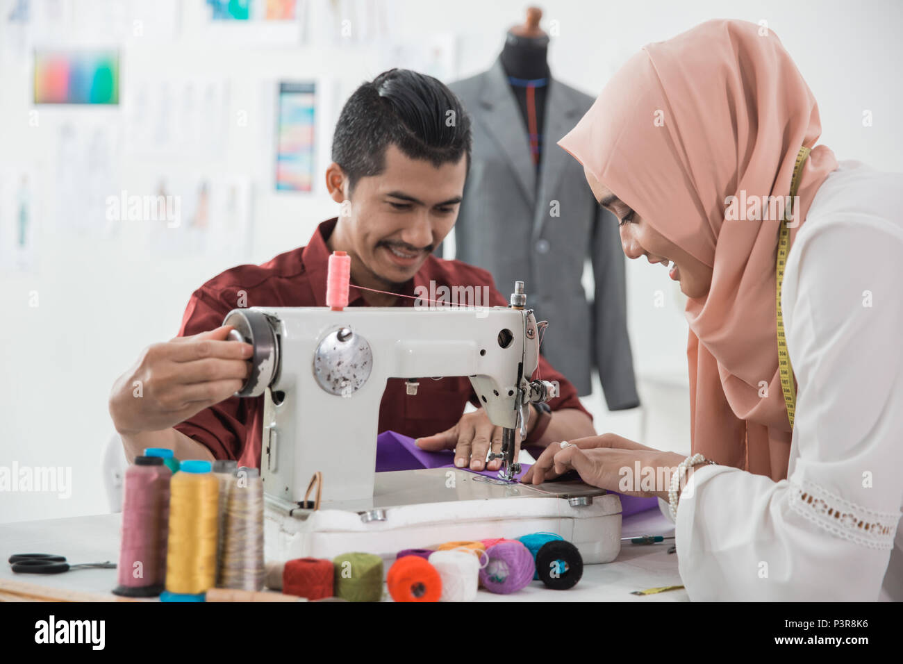 Asian female designer sewing machine hi-res stock photography and ...