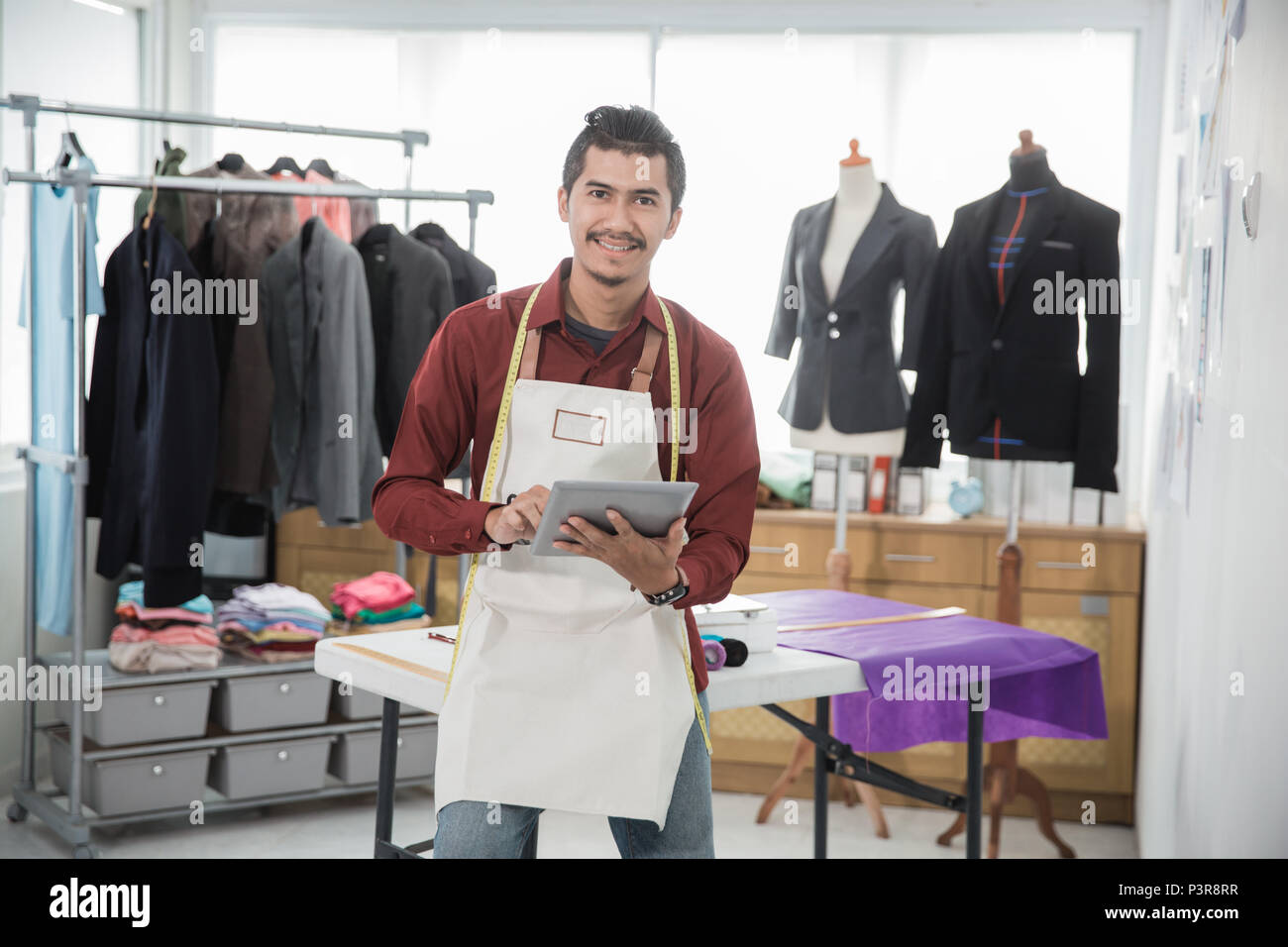 asian fashion designer portrait smiling Stock Photo - Alamy