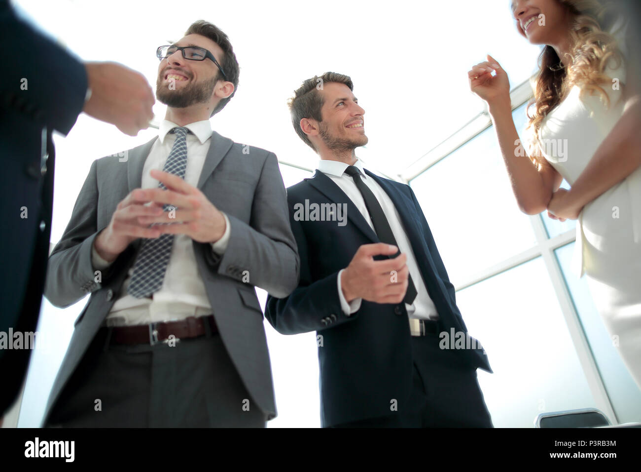 bottom view.group of business people standing in the office Stock Photo ...