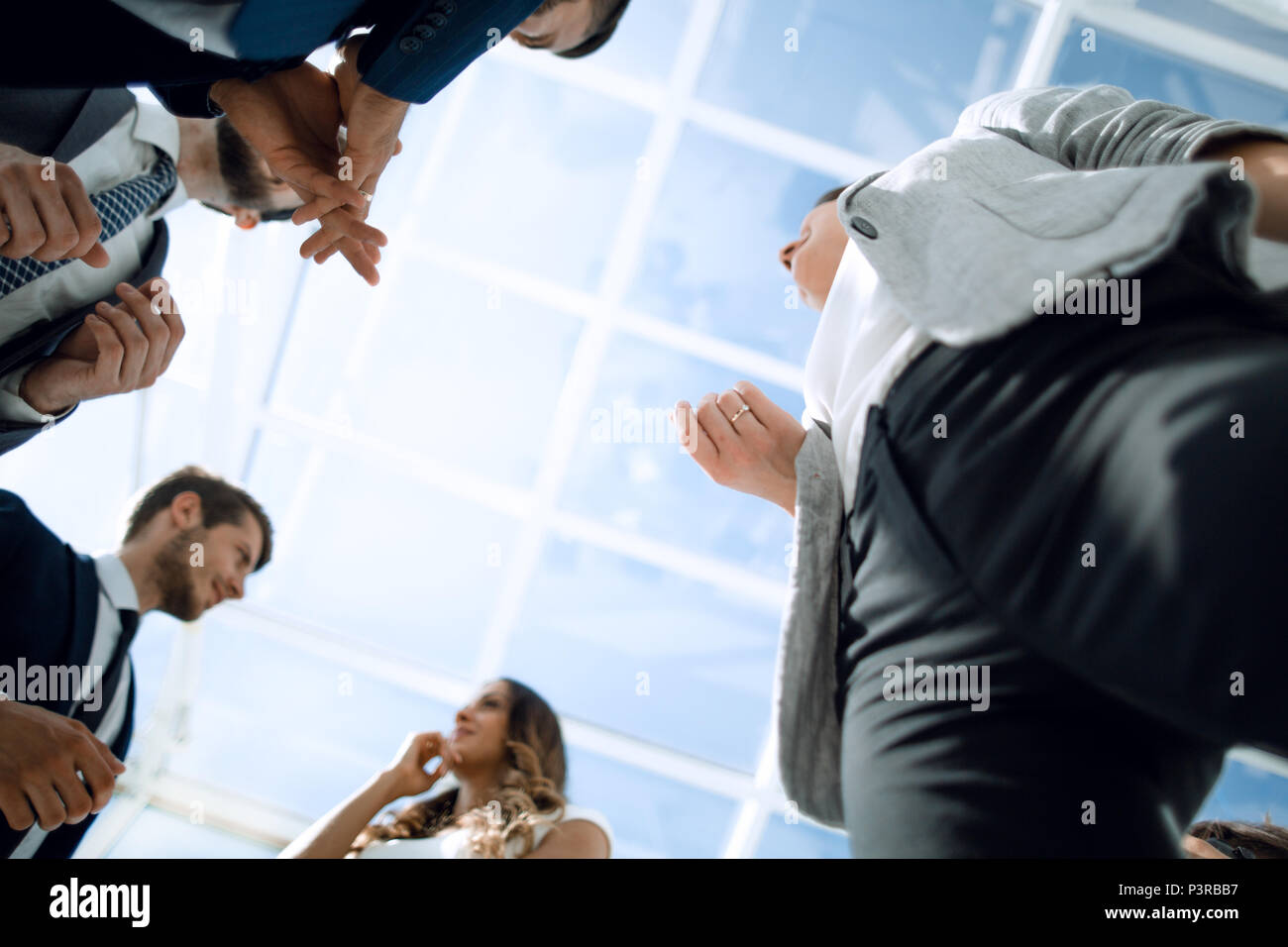 Bottom view colleagues standing hi-res stock photography and images - Alamy