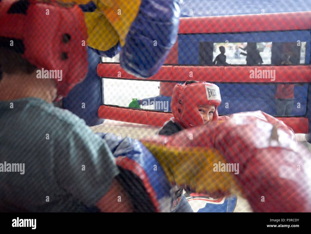 Rowen Wiederspohn and Burke Macaraeg, box in a bouncy boxing ring with ...