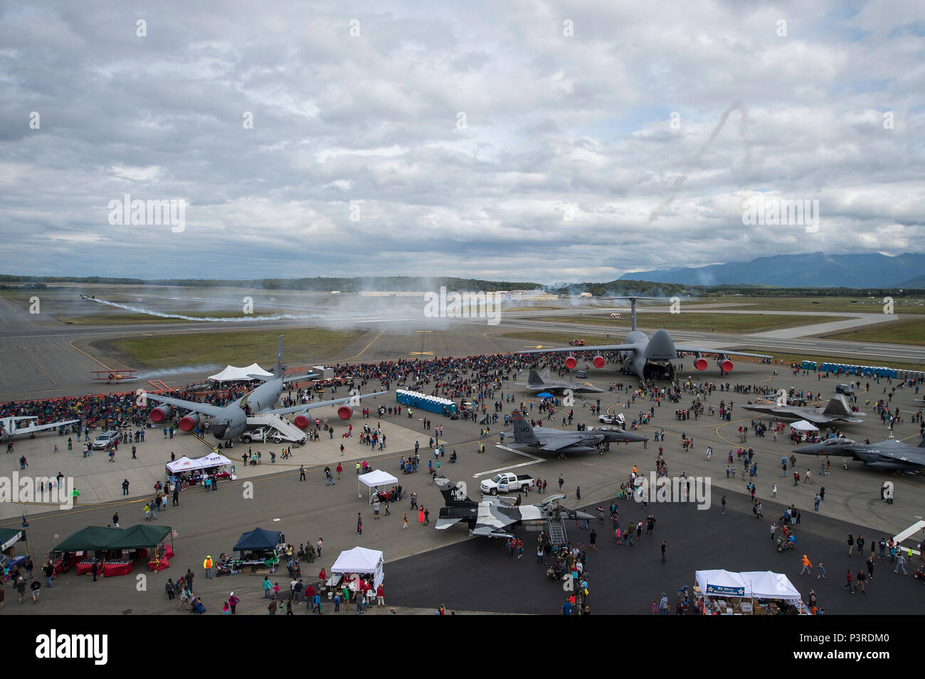Guests visit various static displays during the Arctic Thunder Open ...