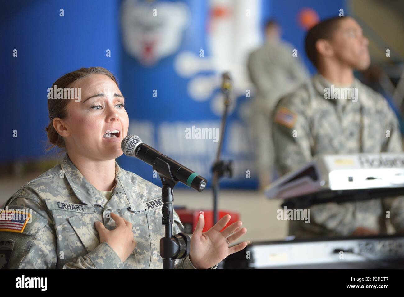 Army Sgt. Jessica Earhart, vocalist, and Spc. Victor Nichols, pianist ...