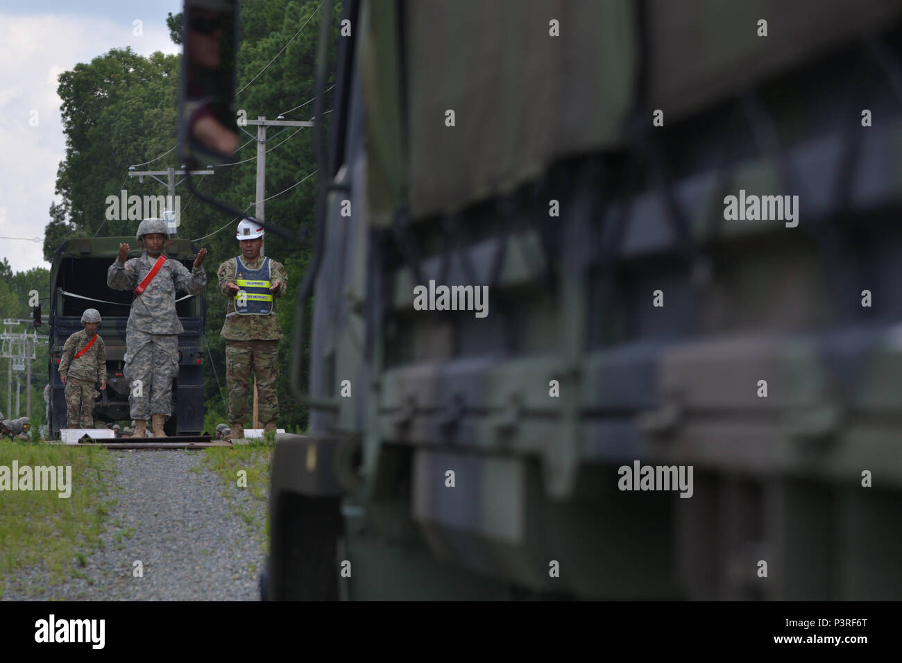 U.S. Army 7th Transportation Brigade (Expeditionary) Soldiers, load ...