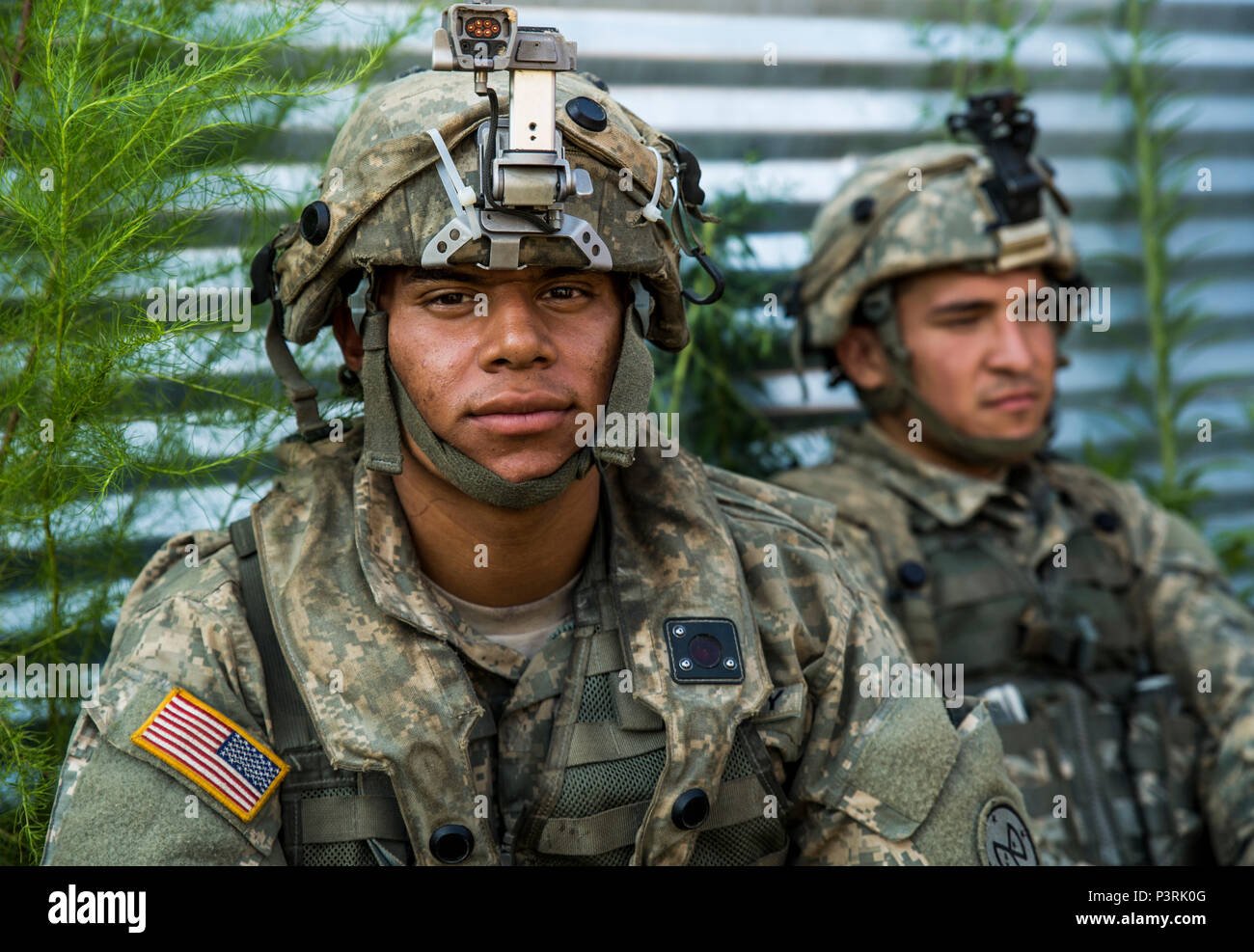 New York Army National Guard Spcs. Kerwin Romero (left) and Kevin ...