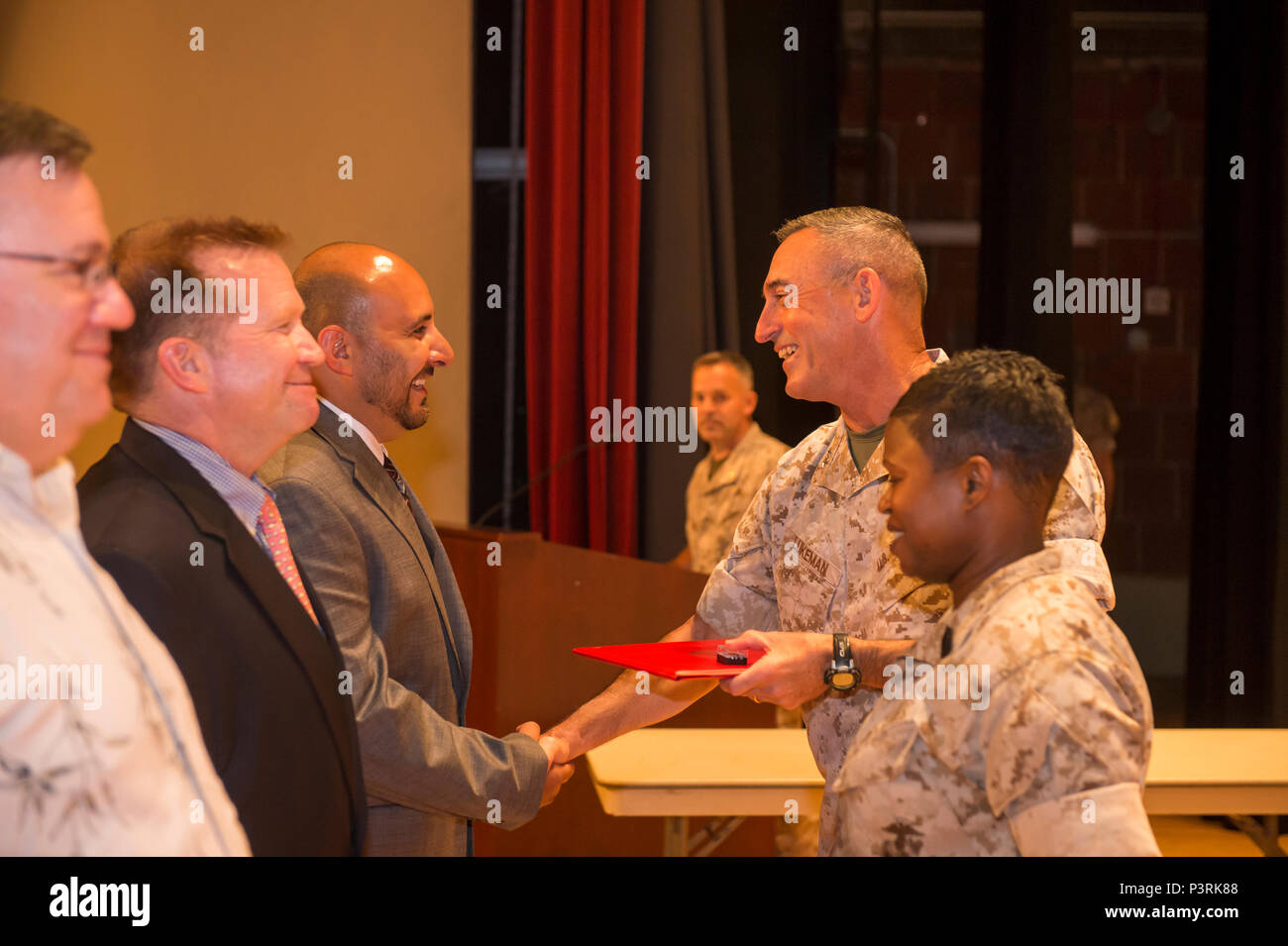 U.S. Marine Corps civilians with Training and Education Command recieve ...