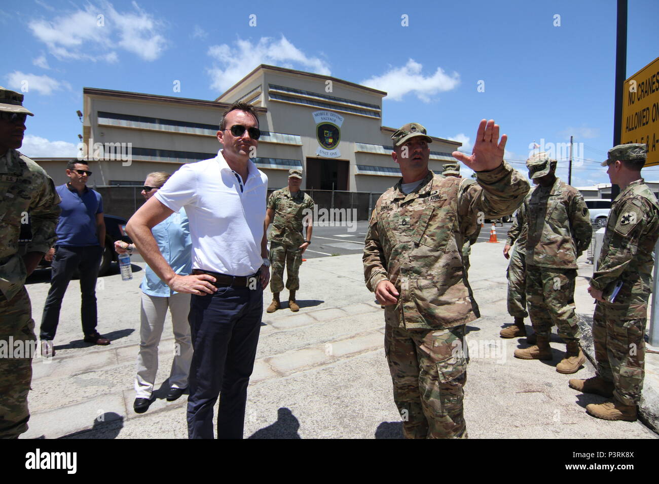Sgt. First Class Tim Carman, 605th Transportation Co., greets Secretary ...