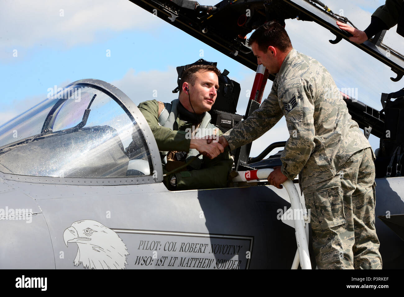 U.S. Air Force Col. Robert Novotny, 48th Fighter Wing commander, shakes ...