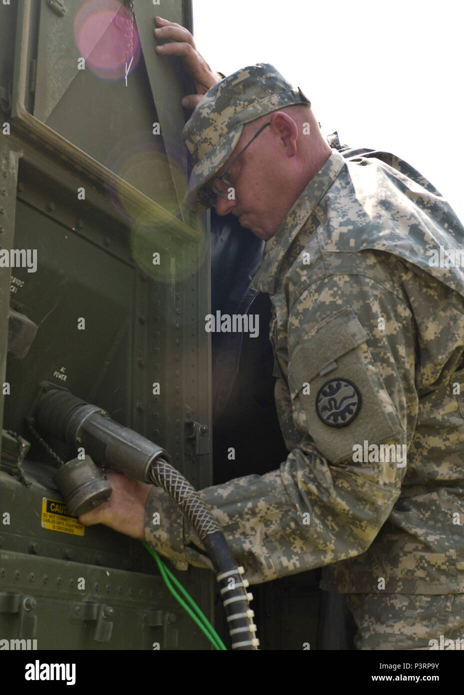 Army Sgt. James Morgan, the High Capacity Line-Of-Sight (HCLOS) radio ...