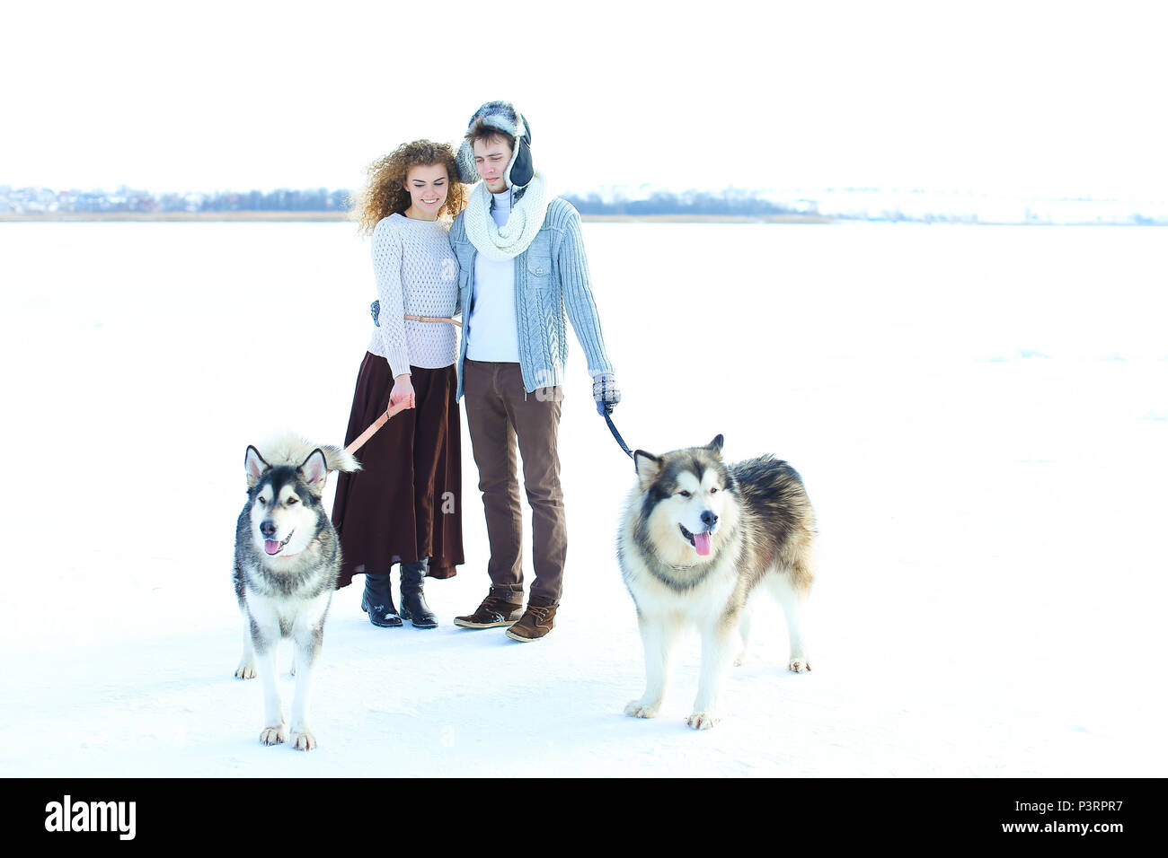 Female walking huskies hi-res stock photography and images - Alamy