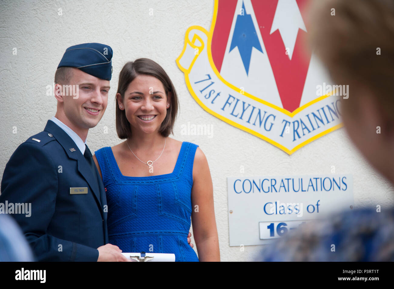 2nd Lt. Joshua Feltner poses with his wife after graduating as a pilot ...