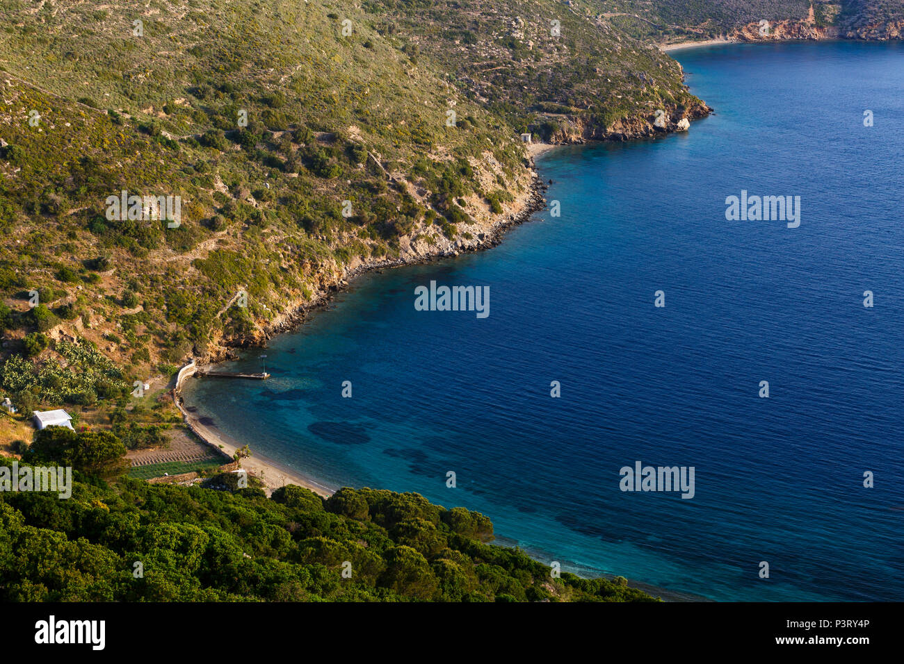 House and gardens at Koumara beach on Fourni island, Greece Stock Photo ...
