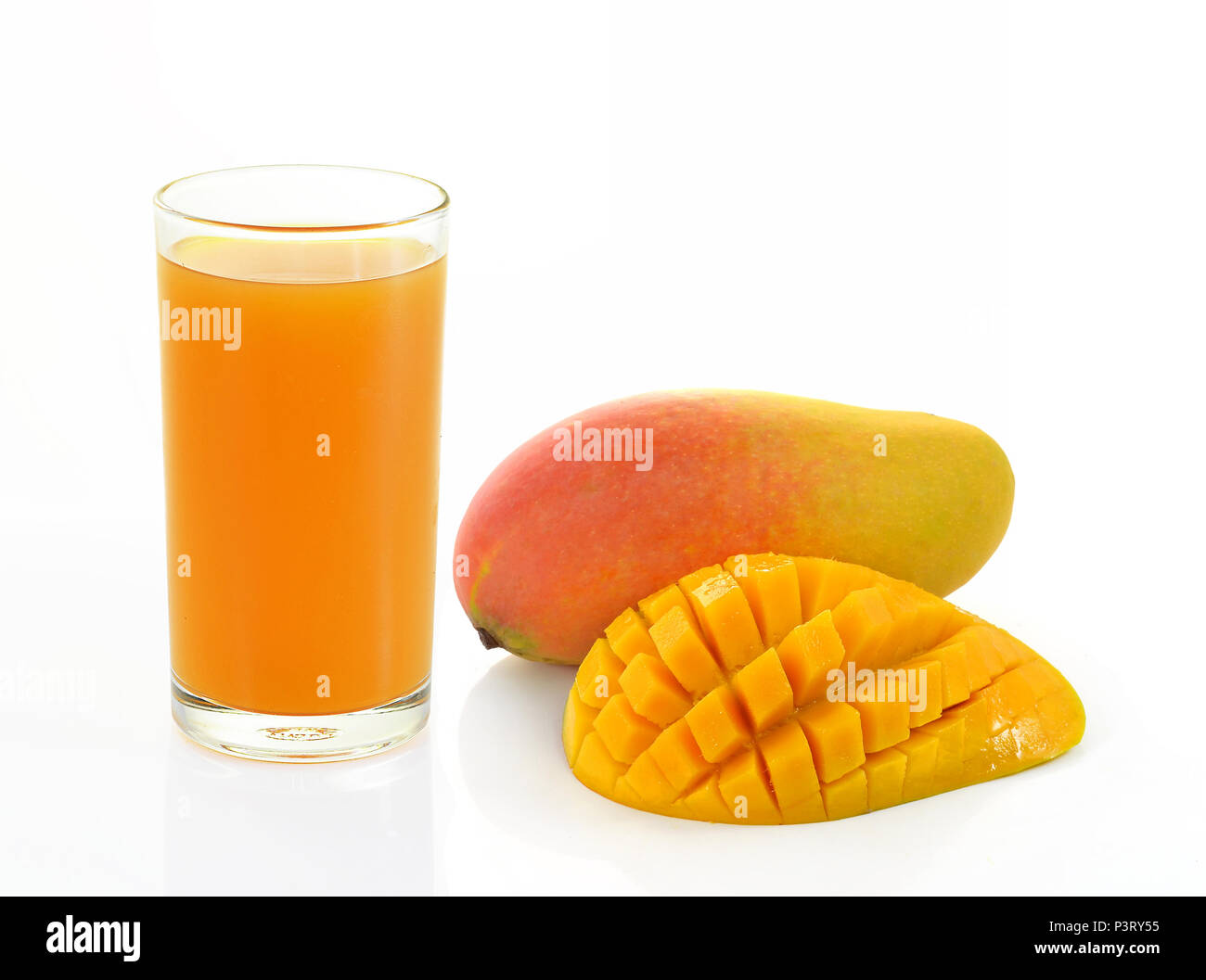 Full glass of Mango Juice and mango isolated on white background Stock ...