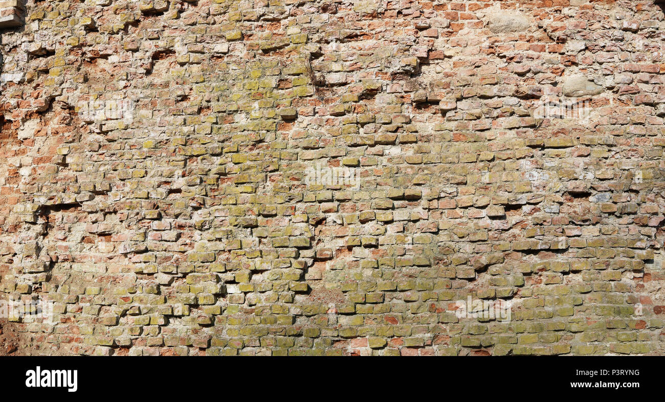This wall was built three hundred years ago from self-made clay bricks ...