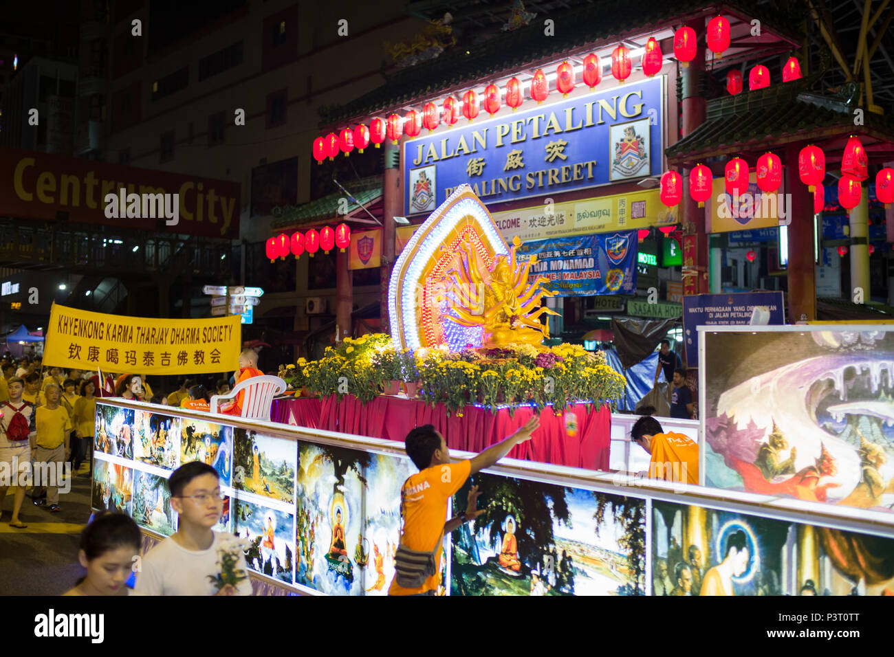 Wesak procession floats vehicles and buddhist pilgrims Passing through ...