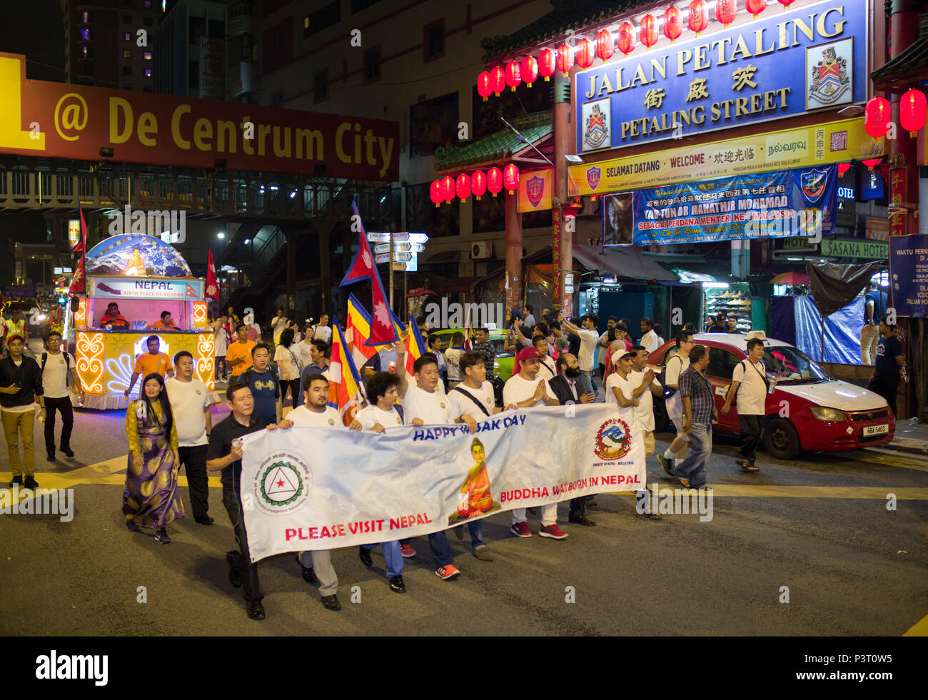 Wesak procession floats vehicles and buddhist pilgrims Passing through ...