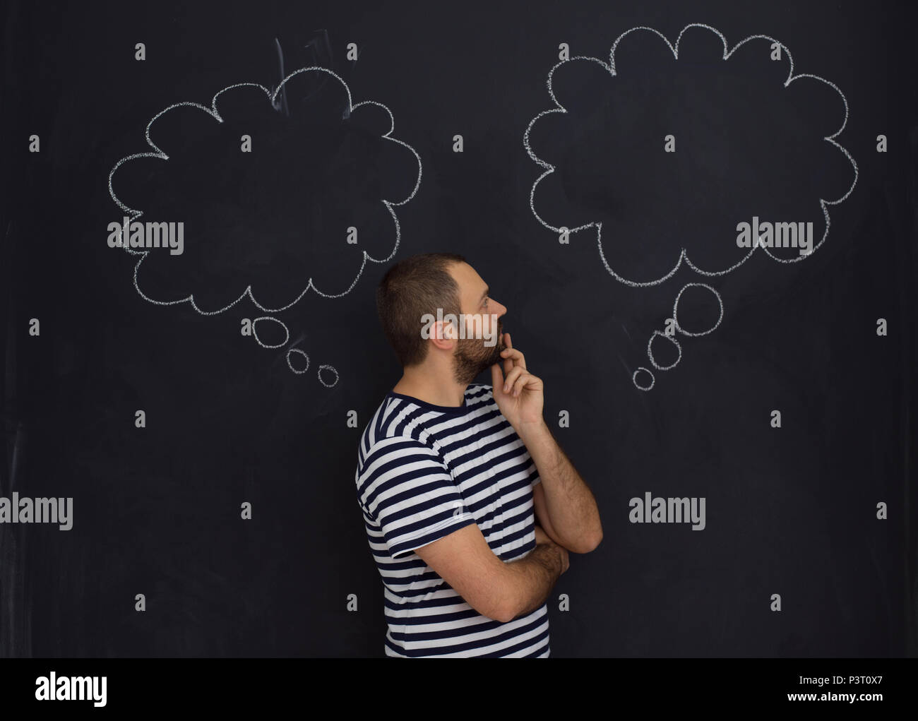 young future father thinking about names for his unborn baby to writing ...