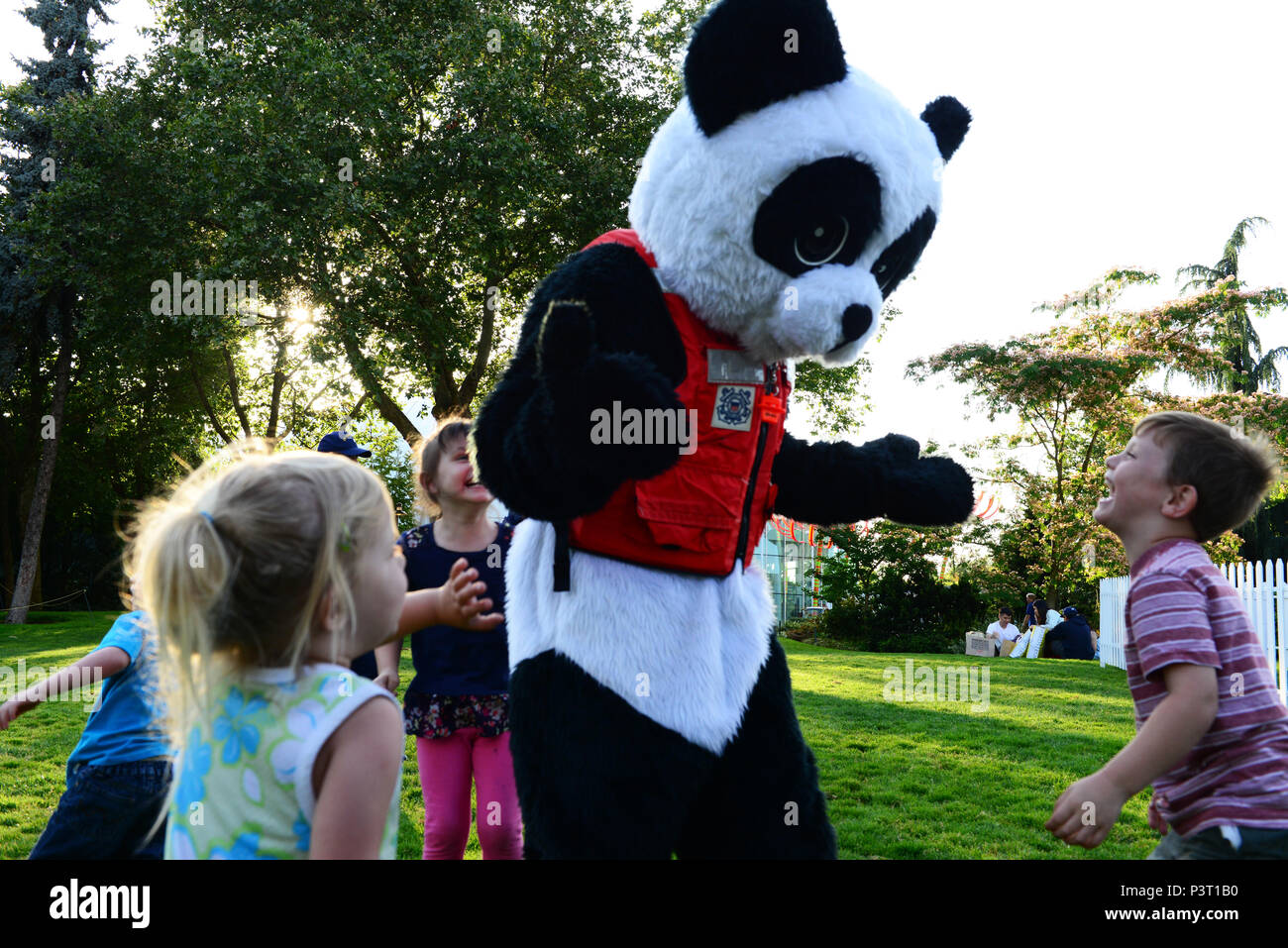Fireman Nicholas Childers, dressed as PFD Panda, entertains kids before ...