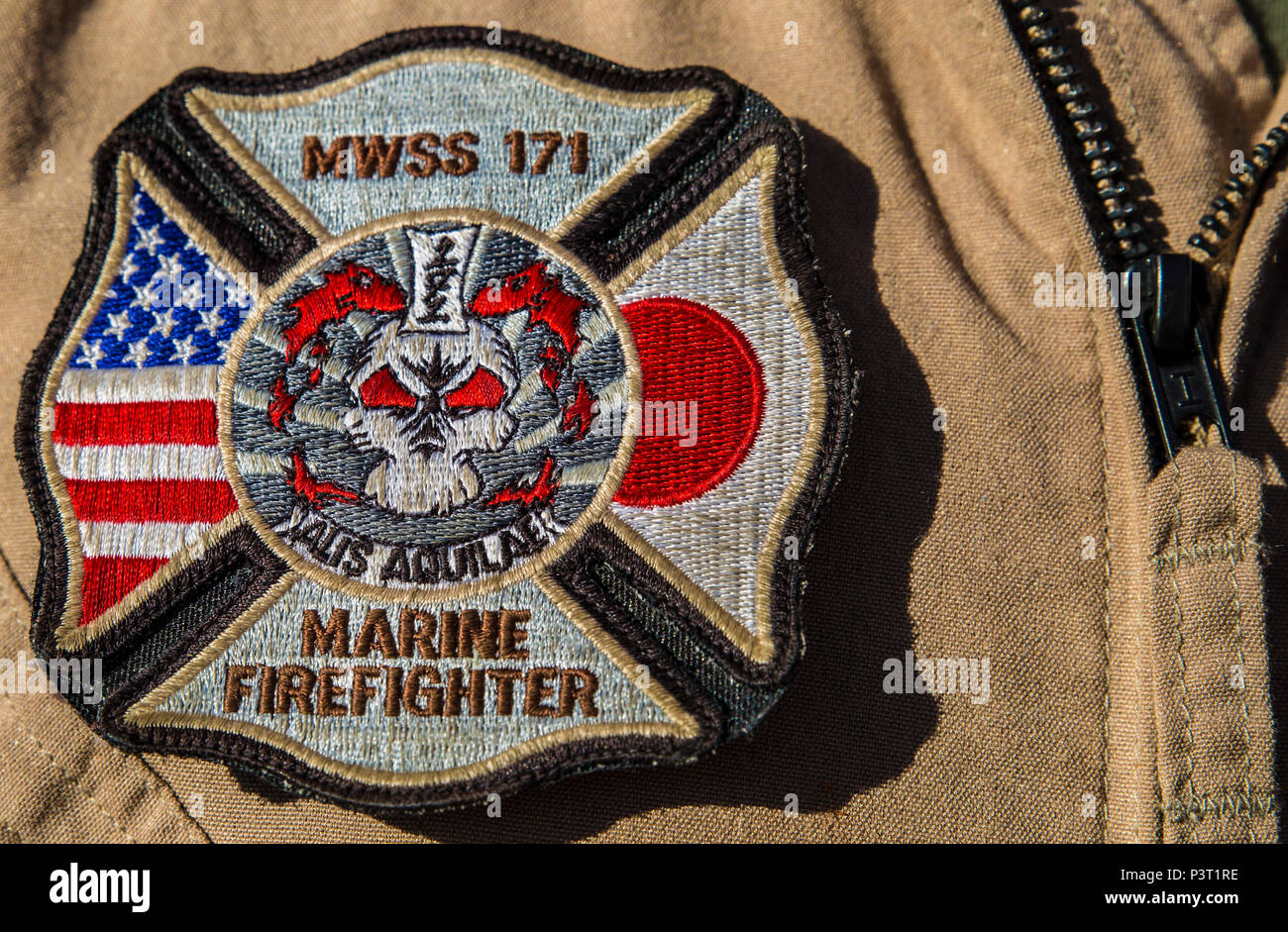 U.S. Marine Corps Cpl. Michael Barton, an aircraft rescue firefighter ...