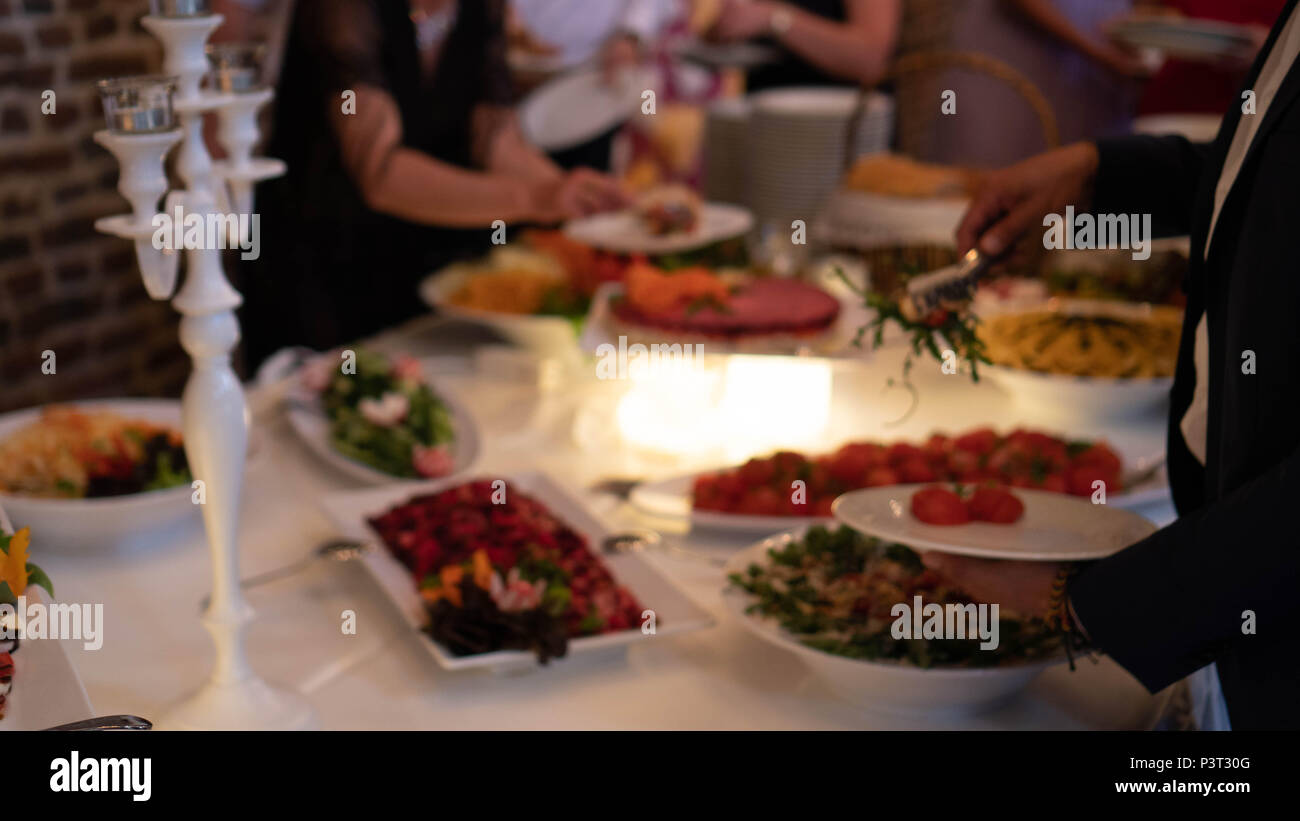 catering services background with snacks on guests table in restaurant ...