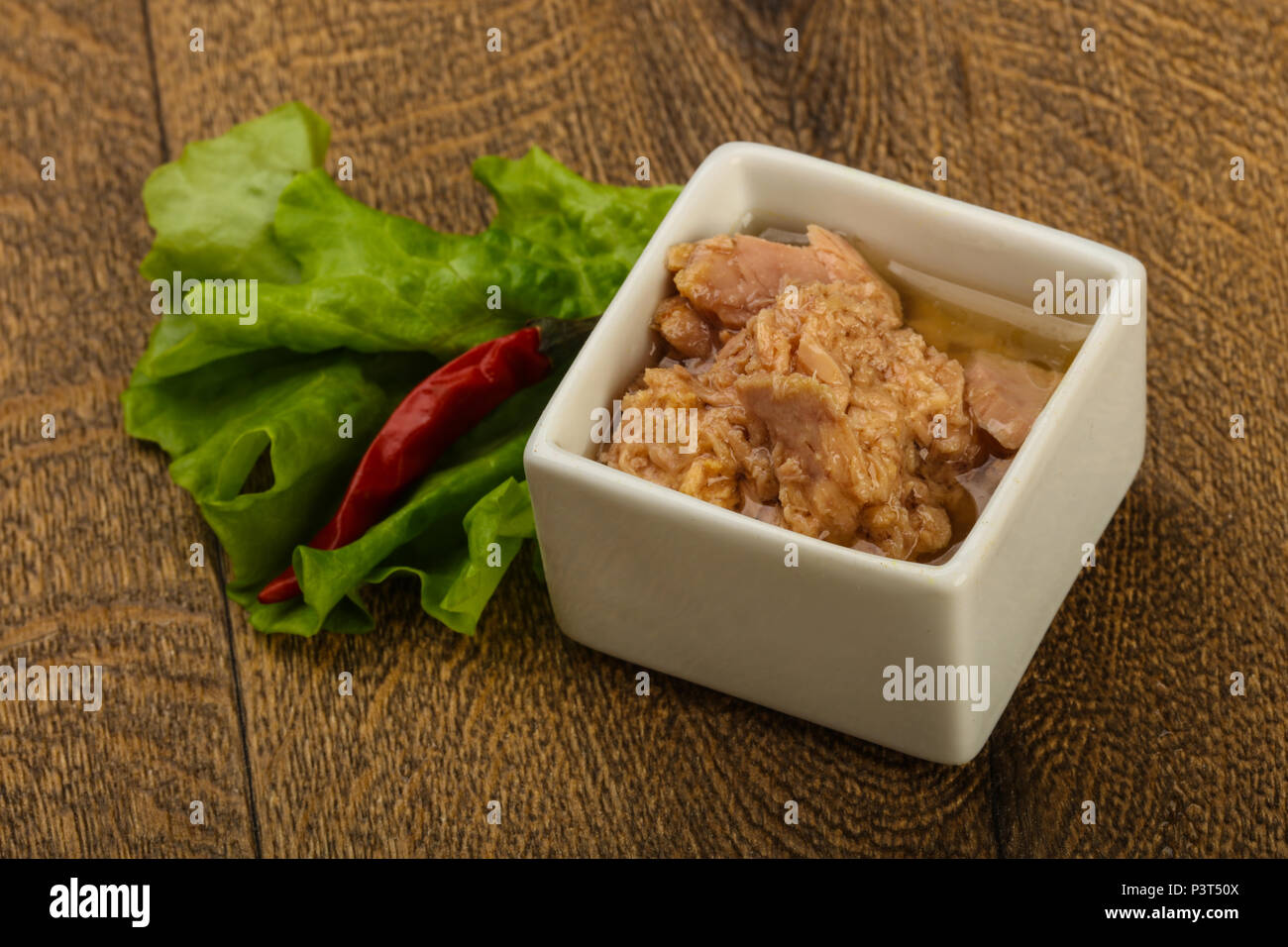 Canned tuna fish in the bowl ready for cooking Stock Photo - Alamy