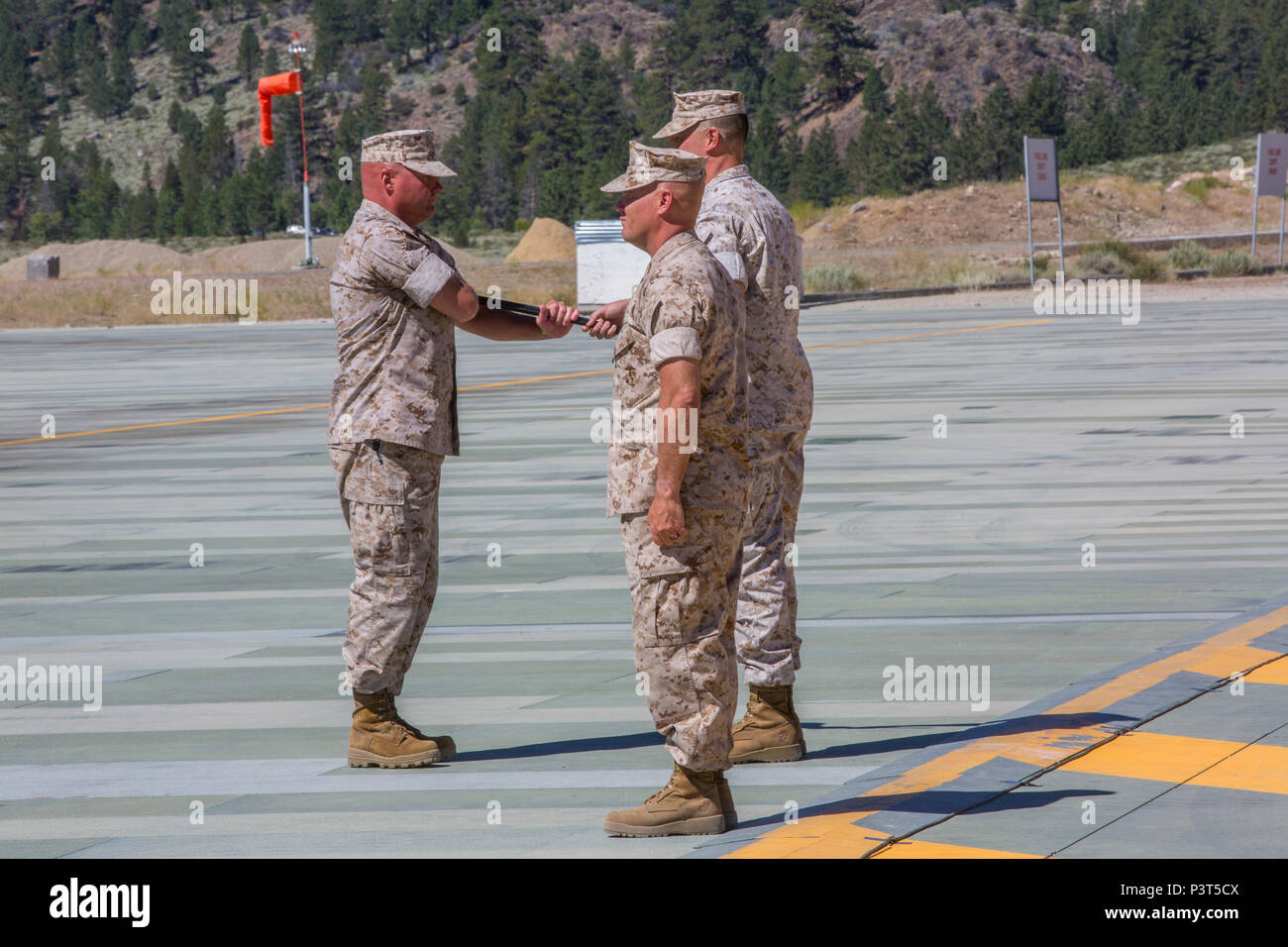 Sgt. Maj. Steven Brunner, outgoing sergeant major, passes the ...