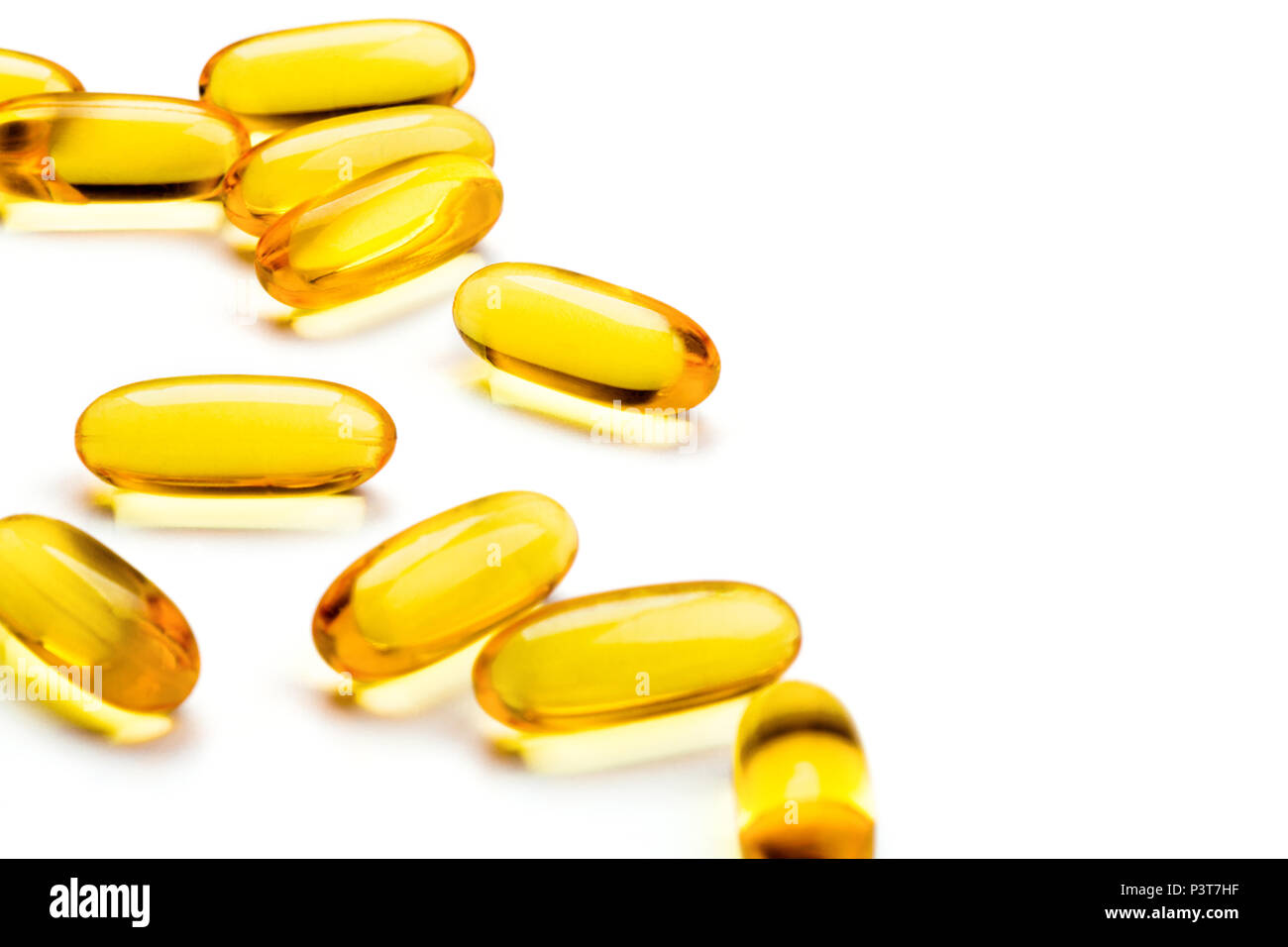 Omega3 gel capsule yellow Cut Out Stock Images & Pictures - Alamy