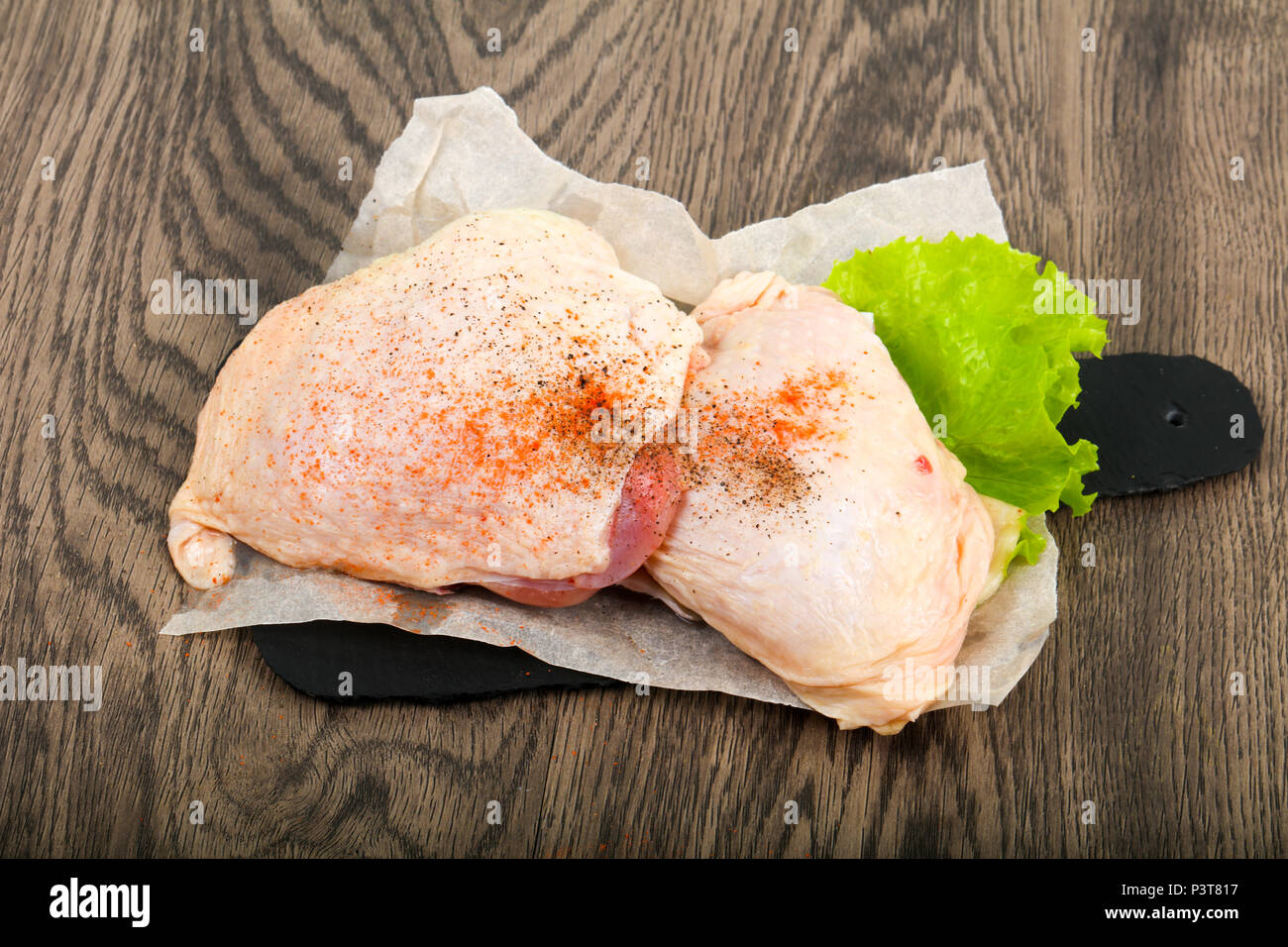 Raw chicken thighs ready for cooking Stock Photo - Alamy