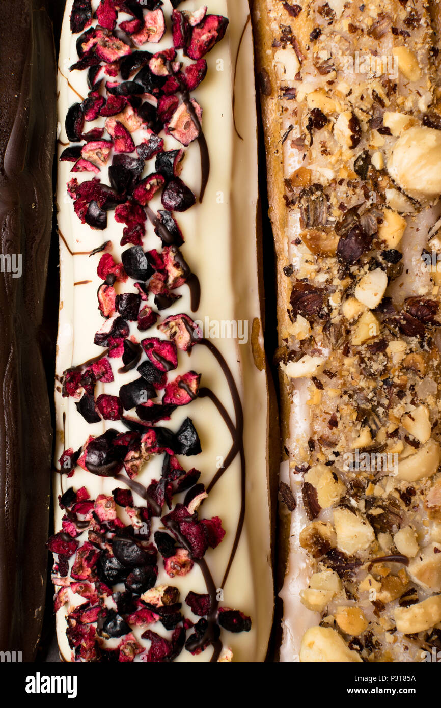 Sweet delicious colorful french eclairs. Group of french dessert ...