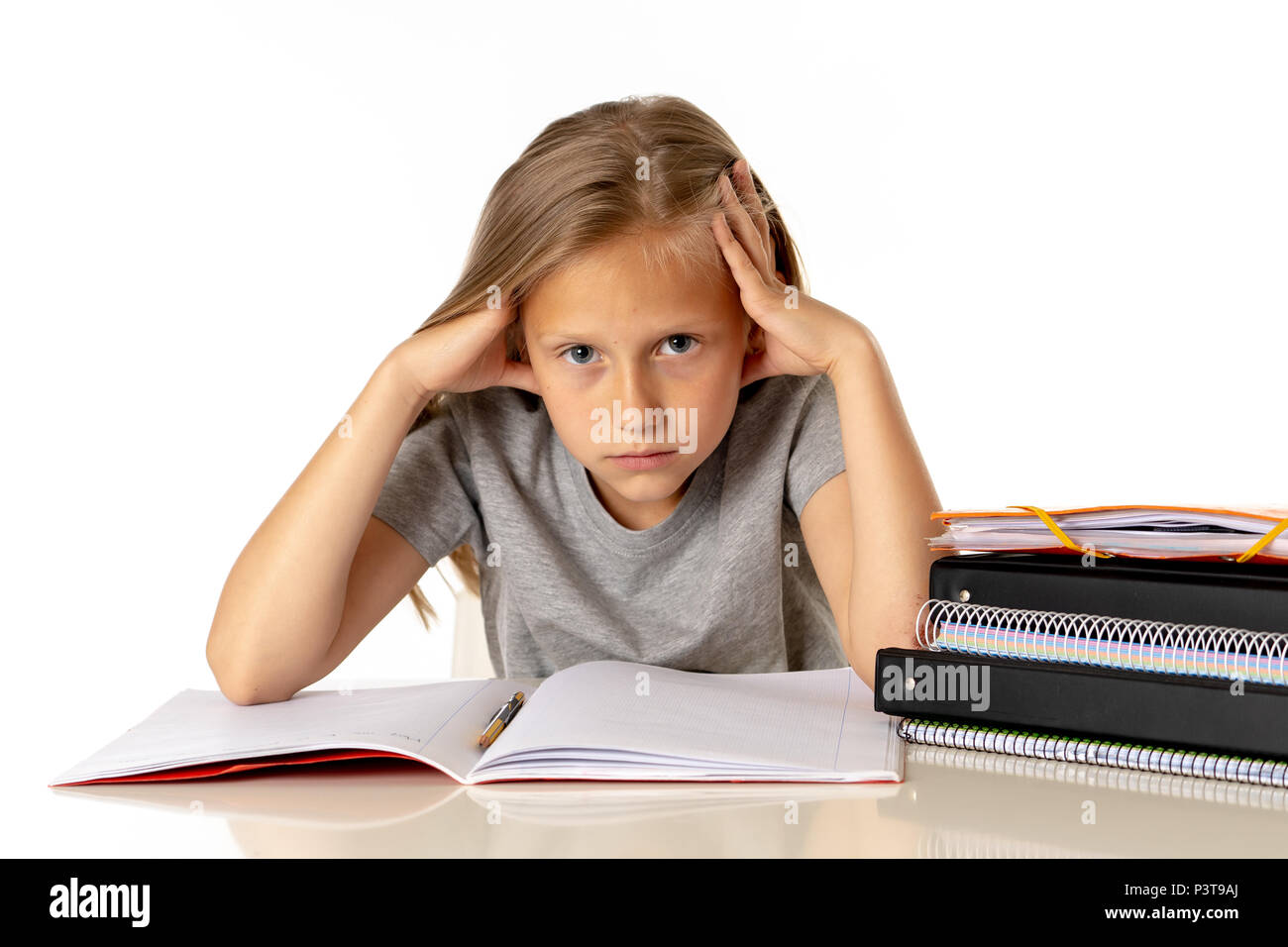 Young schoolgirl doing homework in hi-res stock photography and images ...