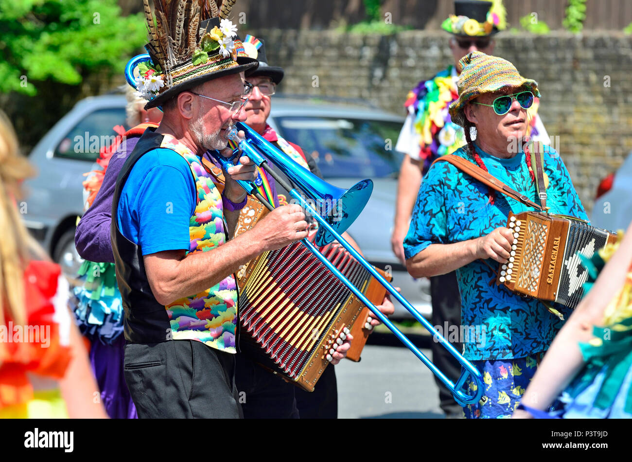 Colourful band with a metalic blue trombone playing for a female Morris ...