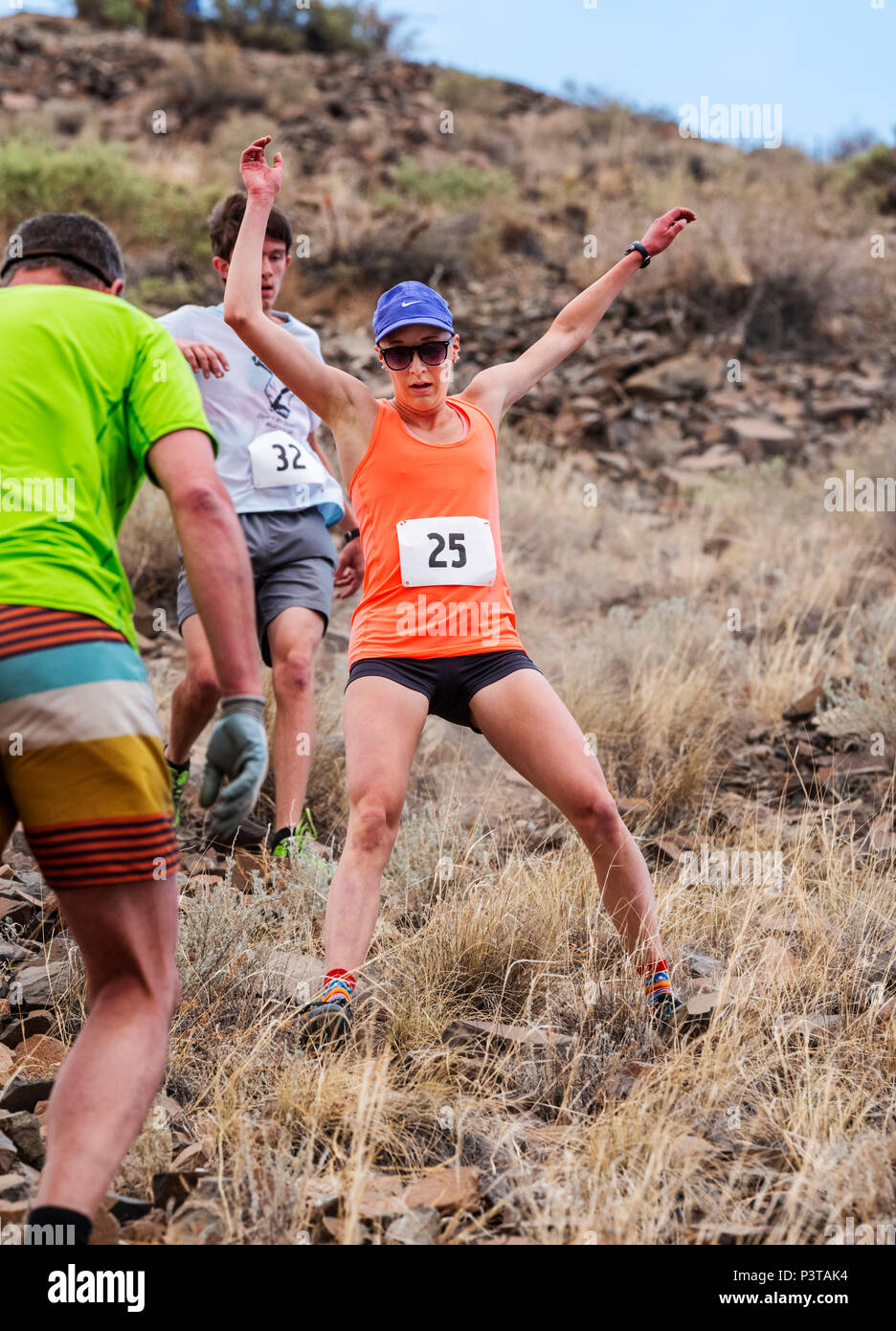 Female athlete & race winner Taryn Ceglowski competes in a foot race ...