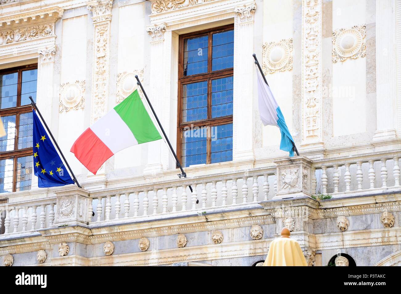 Italian and European flags on municipal building facade Stock Photo - Alamy