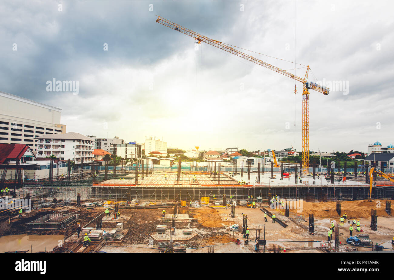 Work of the crane on the construction site Stock Photo - Alamy