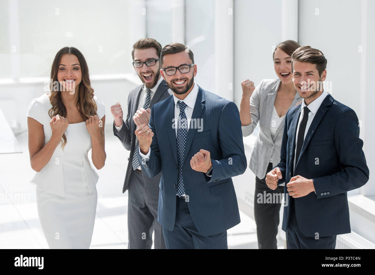 Foreground happy work team hi-res stock photography and images - Alamy