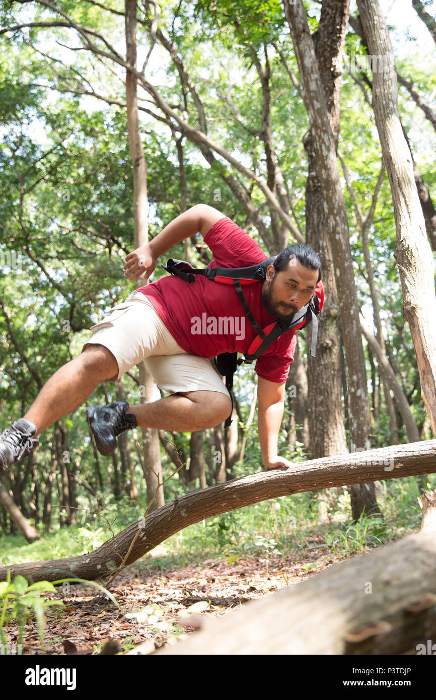 Man hiker jumping crossing hi-res stock photography and images - Alamy