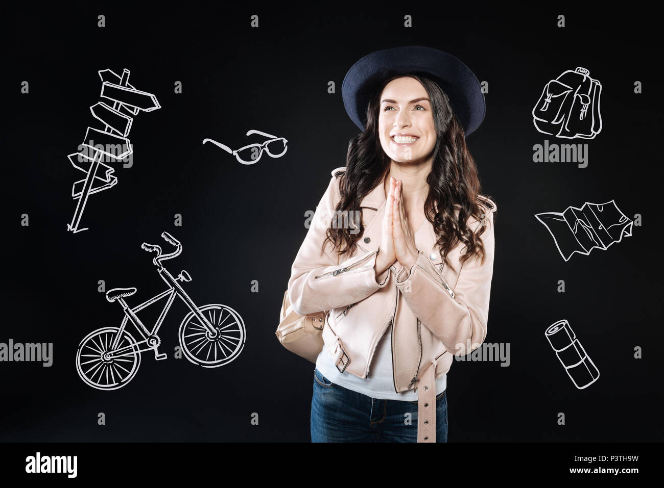 Excited young person clapping while waiting for the journey Stock Photo ...