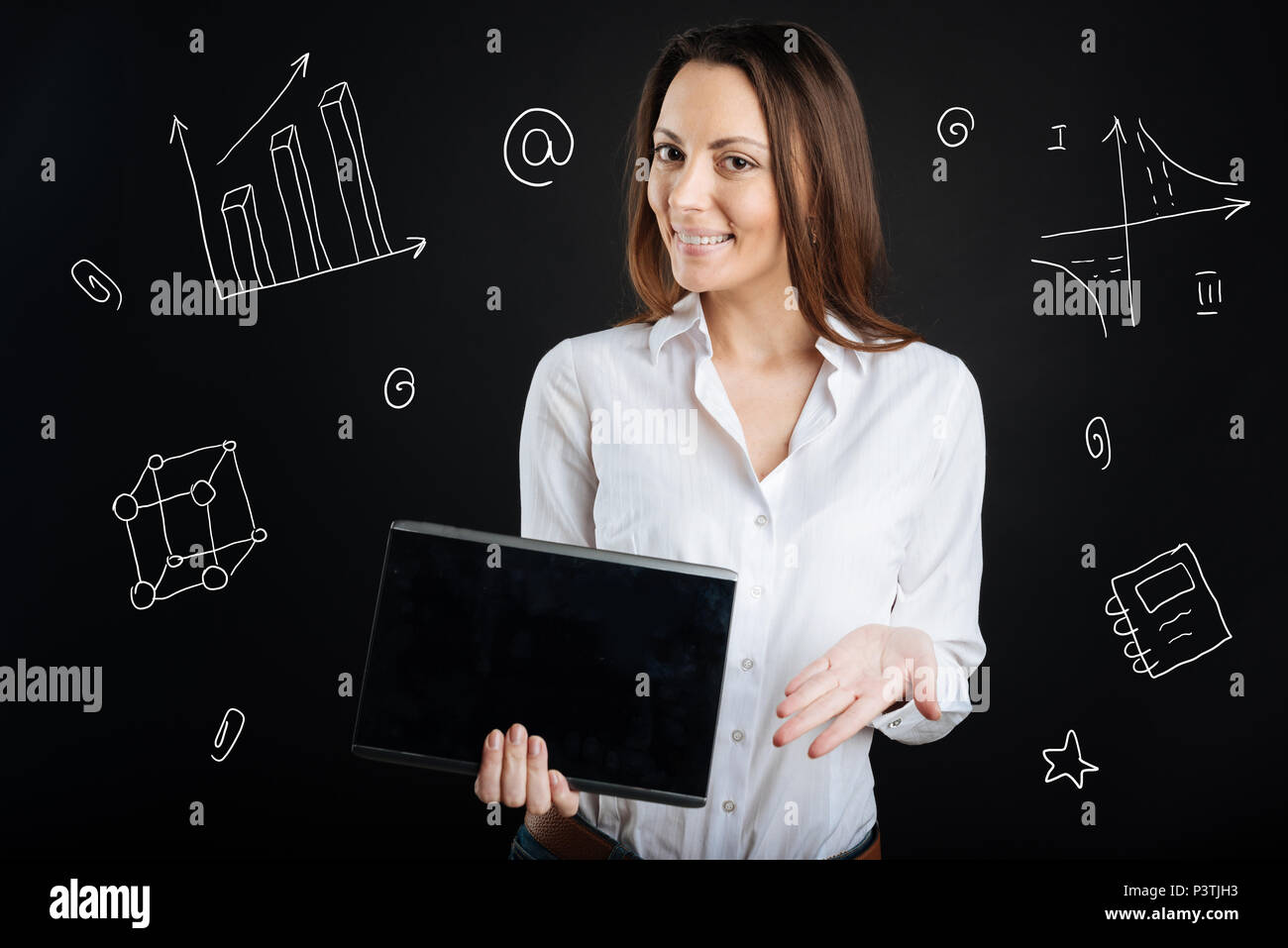 Staff manager smiling while introducing her company Stock Photo - Alamy