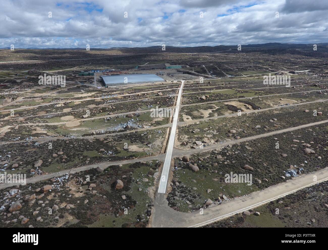 Daocheng. 19th June, 2018. Aerial photo taken on June 19, 2018 shows ...