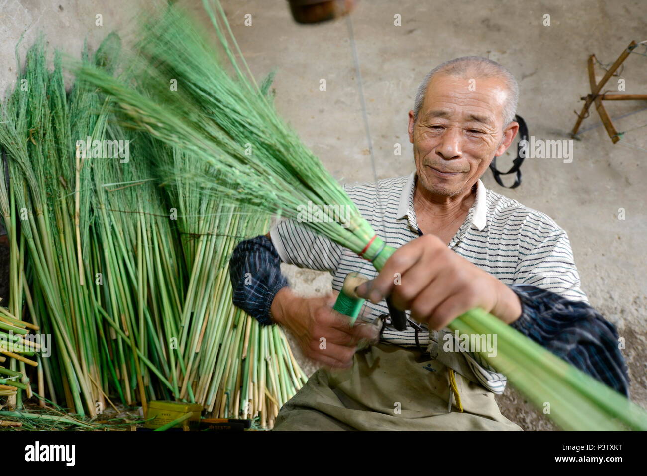 Man with a broom hi-res stock photography and images - Alamy