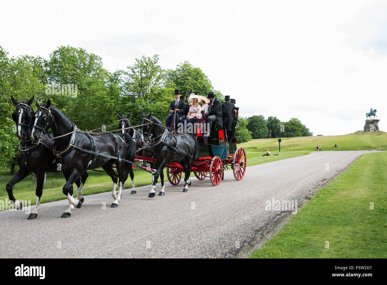 Windsor, UK. 19th June, 2018. Horse drawn carriages carry smartly ...
