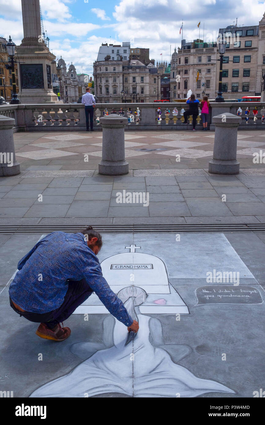 Artist drawing on the pavement of trafalgar square hi-res stock ...