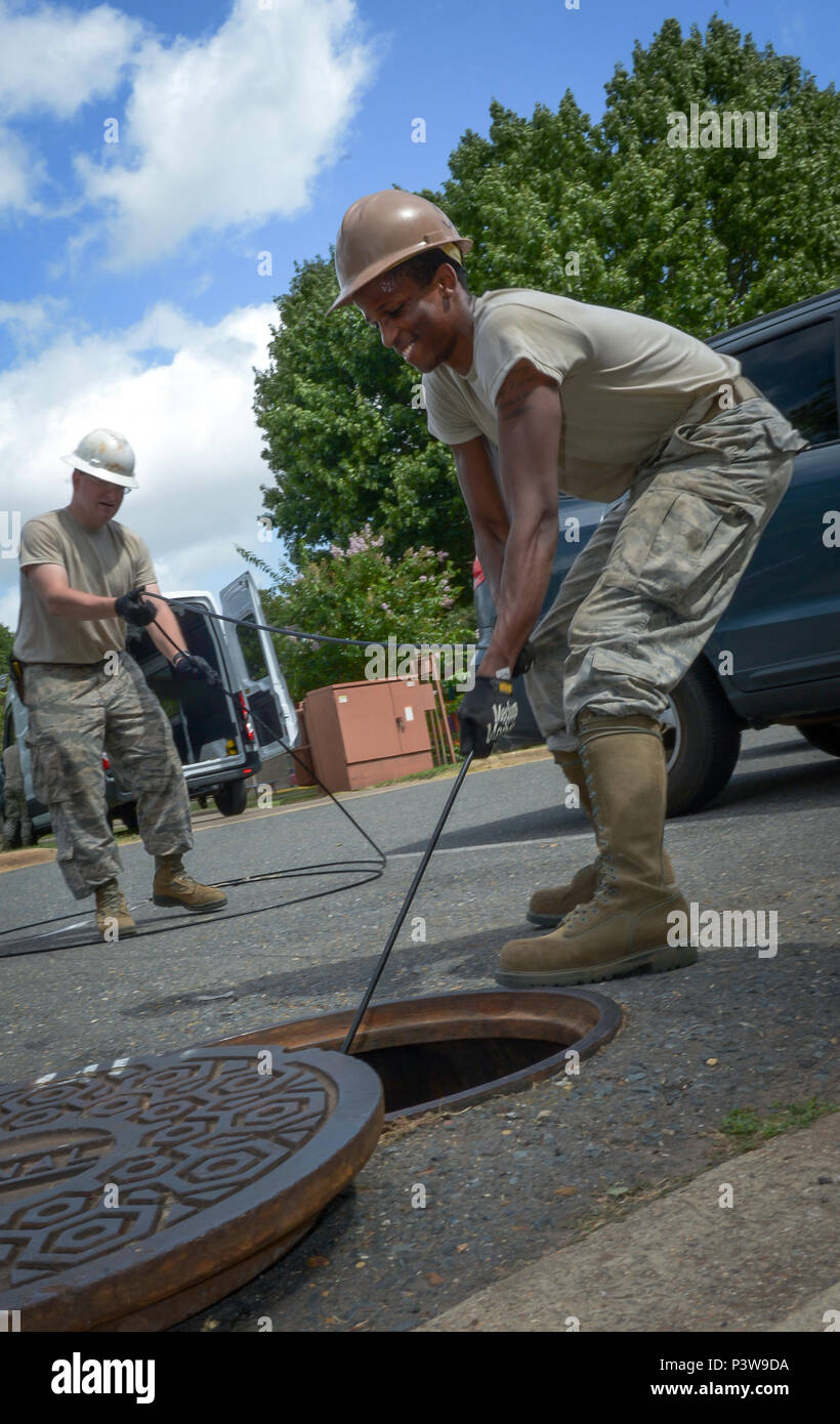Senior Airman Aaron Griffin, foreground, and Tech. Sgt. John Hines, 2nd ...