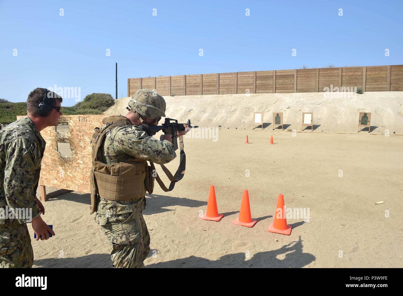 A seabee attached to naval mobile construction battalion nmcb 5 hi-res ...
